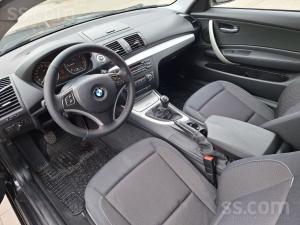 Black BMW 116 2010 in Riga, with an engine capacity of 2.00 L and mileage of 271 thousand km for 3500 €, photo 11 on AUTOMOTO.COM.LV