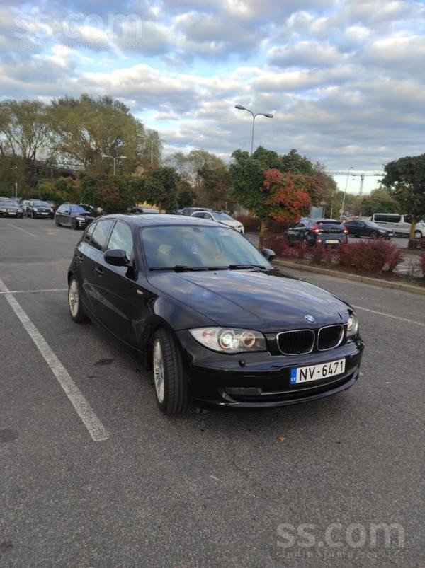 Black BMW 116 2010 in Riga, with an engine capacity of 2.00 L and mileage of 213 thousand km for 4500 €, photo 1 on AUTOMOTO.COM.LV