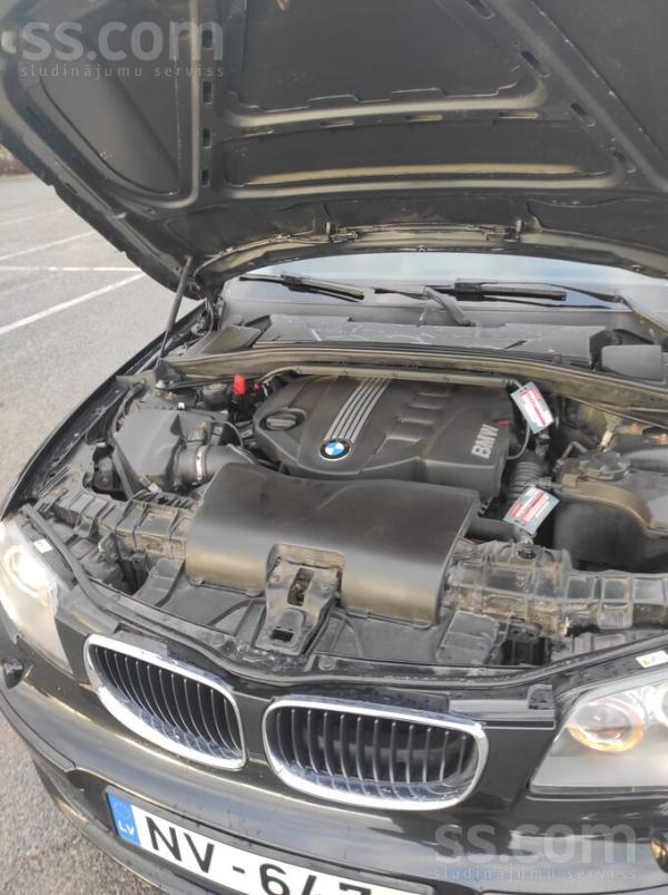 Black BMW 116 2010 in Riga, with an engine capacity of 2.00 L and mileage of 213 thousand km for 4500 €, photo 4 on AUTOMOTO.COM.LV