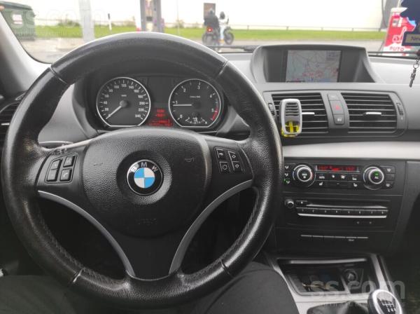Black BMW 116 2010 in Riga, with an engine capacity of 2.00 L and mileage of 213 thousand km for 4500 €, photo 6 on AUTOMOTO.COM.LV