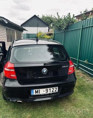 Black BMW 116 2010 in Daugavpils, with an engine capacity of 2.00 L and mileage of 290 thousand km for 3850 €, photo 4 on AUTOMOTO.COM.LV