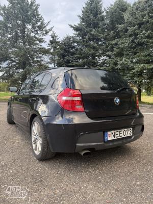 Black BMW 116 2010 in Prienai, with an engine capacity of 2.00 L and mileage of 365 thousand km for 3099 €, photo  on AUTOMOTO.COM.LV