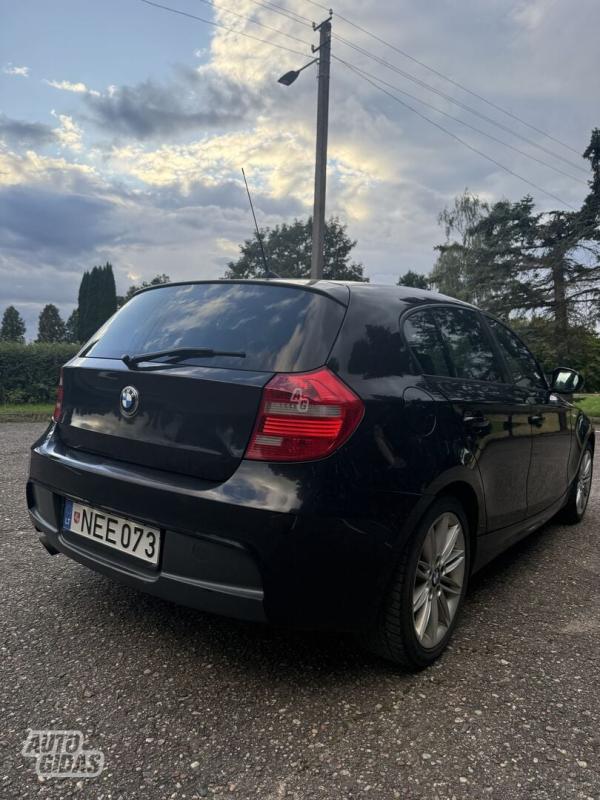 Black BMW 116 2010 in Prienai, with an engine capacity of 2.00 L and mileage of 365 thousand km for 3099 €, photo 3 on AUTOMOTO.COM.LV