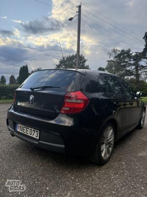 Black BMW 116 2010 in Prienai, with an engine capacity of 2.00 L and mileage of 365 thousand km for 3099 €, photo 3 on AUTOMOTO.COM.LV
