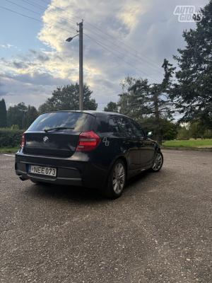 Black BMW 116 2010 in Prienai, with an engine capacity of 2.00 L and mileage of 365 thousand km for 3099 €, photo 9 on AUTOMOTO.COM.LV