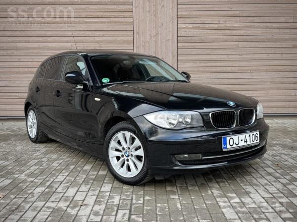 Black BMW 116 2011 in Jelgava, with an engine capacity of 2.00 L and mileage of 297 thousand km for 4150 €, photo 1 on AUTOMOTO.COM.LV