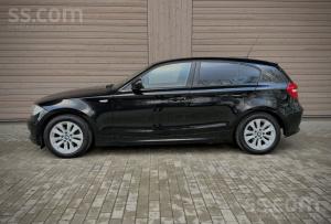 Black BMW 116 2011 in Jelgava, with an engine capacity of 2.00 L and mileage of 297 thousand km for 4150 €, photo 4 on AUTOMOTO.COM.LV