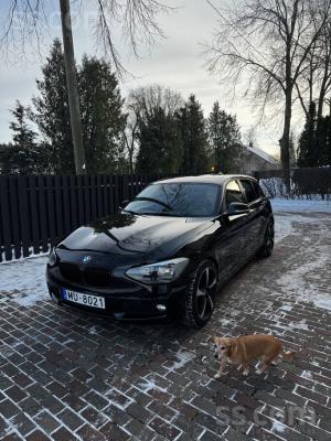 Black BMW 116 2011 in Ventspils, with an engine capacity of 2.00 L and mileage of 249 thousand km for 4299 €, photo  on AUTOMOTO.COM.LV
