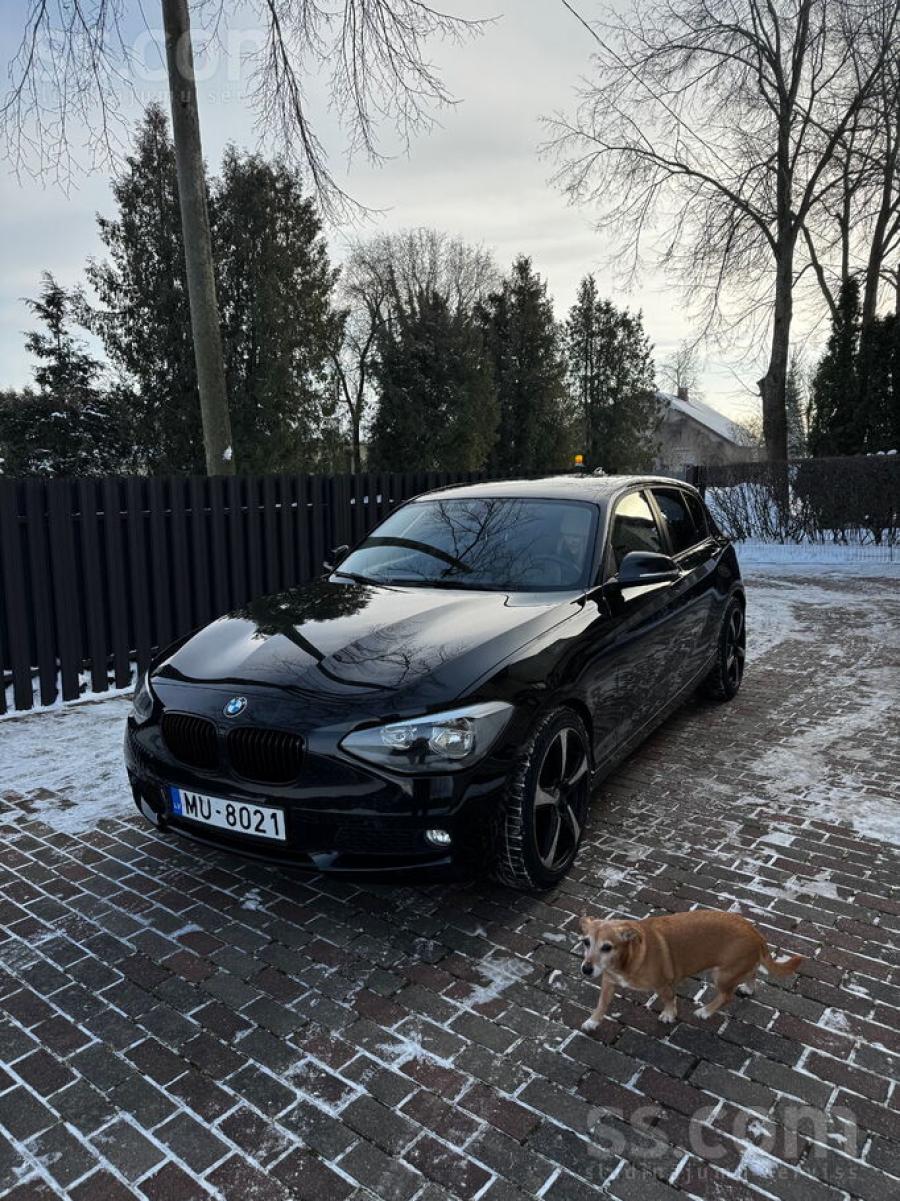Black BMW 116 2011 in Ventspils, with an engine capacity of 2.00 L and mileage of 249 thousand km for 4299 €, photo 1 on AUTOMOTO.COM.LV