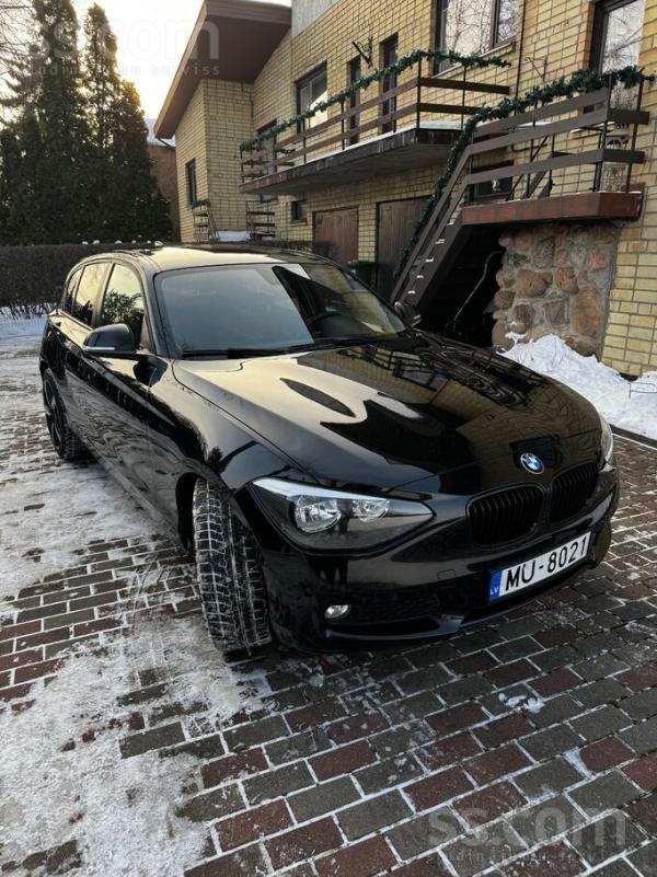 Black BMW 116 2011 in Ventspils, with an engine capacity of 2.00 L and mileage of 249 thousand km for 4299 €, photo 2 on AUTOMOTO.COM.LV