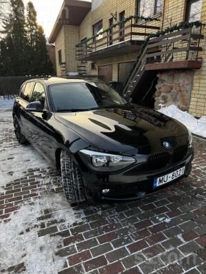 Black BMW 116 2011 in Ventspils, with an engine capacity of 2.00 L and mileage of 249 thousand km for 4299 €, photo 2 on AUTOMOTO.COM.LV
