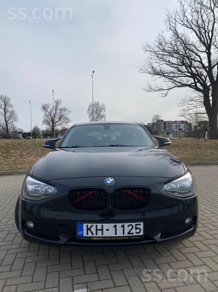 Black BMW 116 2011 in Riga, with an engine capacity of 2.00 L and mileage of 370 thousand km for 4900 €, photo 2 on AUTOMOTO.COM.LV