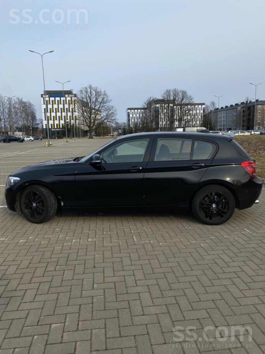 Black BMW 116 2011 in Riga, with an engine capacity of 2.00 L and mileage of 370 thousand km for 4900 €, photo 4 on AUTOMOTO.COM.LV