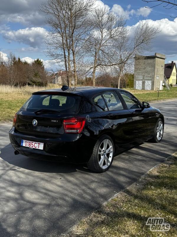 Black BMW 116 2011 in Klaipeda, with an engine capacity of 1.60 L and mileage of 295 thousand km for 5850 €, photo 6 on AUTOMOTO.COM.LV