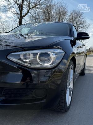 Black BMW 116 2011 in Klaipeda, with an engine capacity of 1.60 L and mileage of 295 thousand km for 5850 €, photo 3 on AUTOMOTO.COM.LV