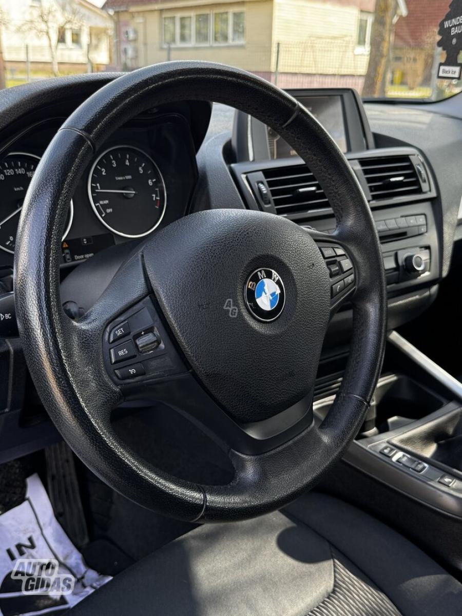 Black BMW 116 2011 in Klaipeda, with an engine capacity of 1.60 L and mileage of 295 thousand km for 5850 €, photo 12 on AUTOMOTO.COM.LV