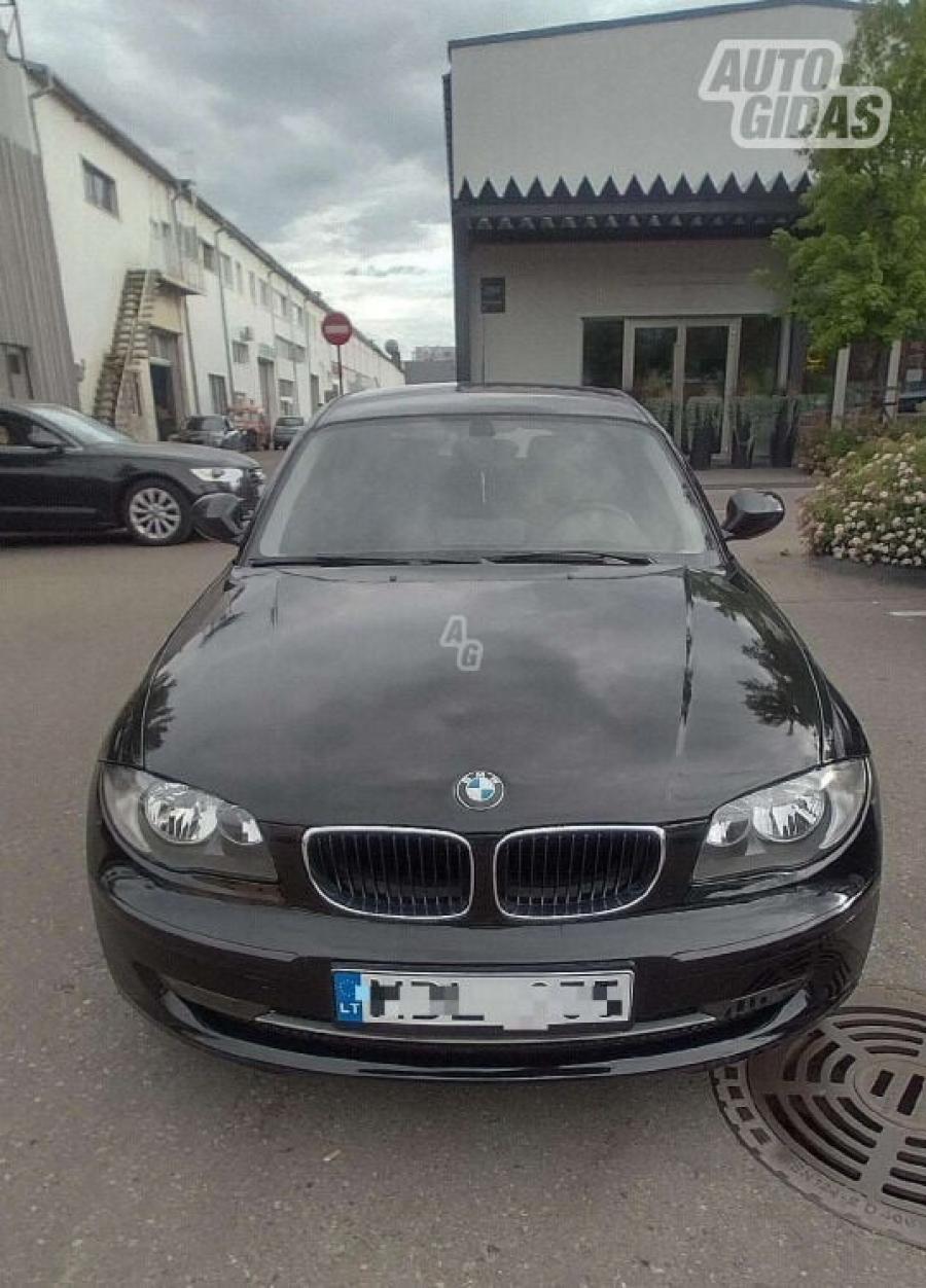 Black BMW 116 2011 in Vilnius, with an engine capacity of 2.00 L and mileage of 255 thousand km for 3277 €, photo 1 on AUTOMOTO.COM.LV