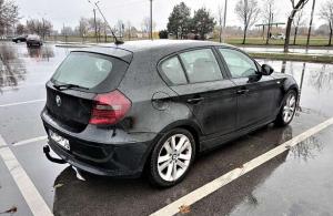 Black BMW 116 2011 in Vilnius, with an engine capacity of 2.00 L and mileage of 255 thousand km for 3277 €, photo 5 on AUTOMOTO.COM.LV