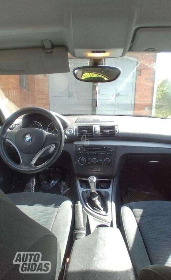 Black BMW 116 2011 in Vilnius, with an engine capacity of 2.00 L and mileage of 255 thousand km for 3277 €, photo 6 on AUTOMOTO.COM.LV