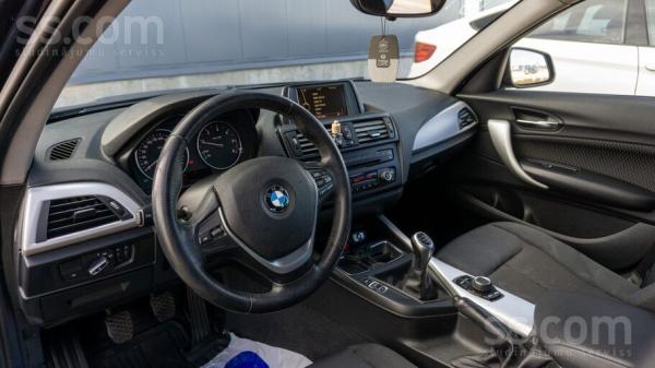 Black BMW 116 2011 in Riga, with an engine capacity of 2.00 L and mileage of 267 thousand km for 5190 €, photo 9 on AUTOMOTO.COM.LV
