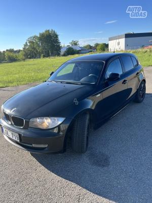 Black BMW 116 2011 in Siauliai, with an engine capacity of 2.00 L and mileage of 295 thousand km for 3500 €, photo  on AUTOMOTO.COM.LV