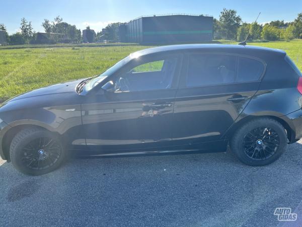 Black BMW 116 2011 in Siauliai, with an engine capacity of 2.00 L and mileage of 295 thousand km for 3500 €, photo 4 on AUTOMOTO.COM.LV