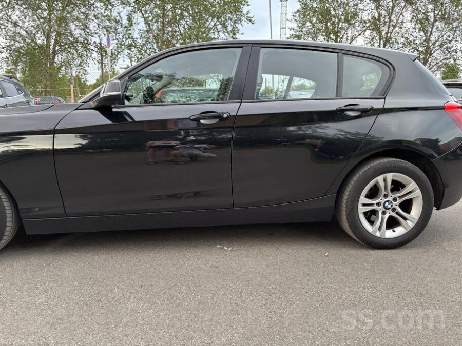 Melns BMW 116 2011 Rīga, ar dzinēja tilpumu 2.00 L un nobraukumu 327 tūkst. km par 5095 €, foto 6 vietnē AUTOMOTO.COM.LV