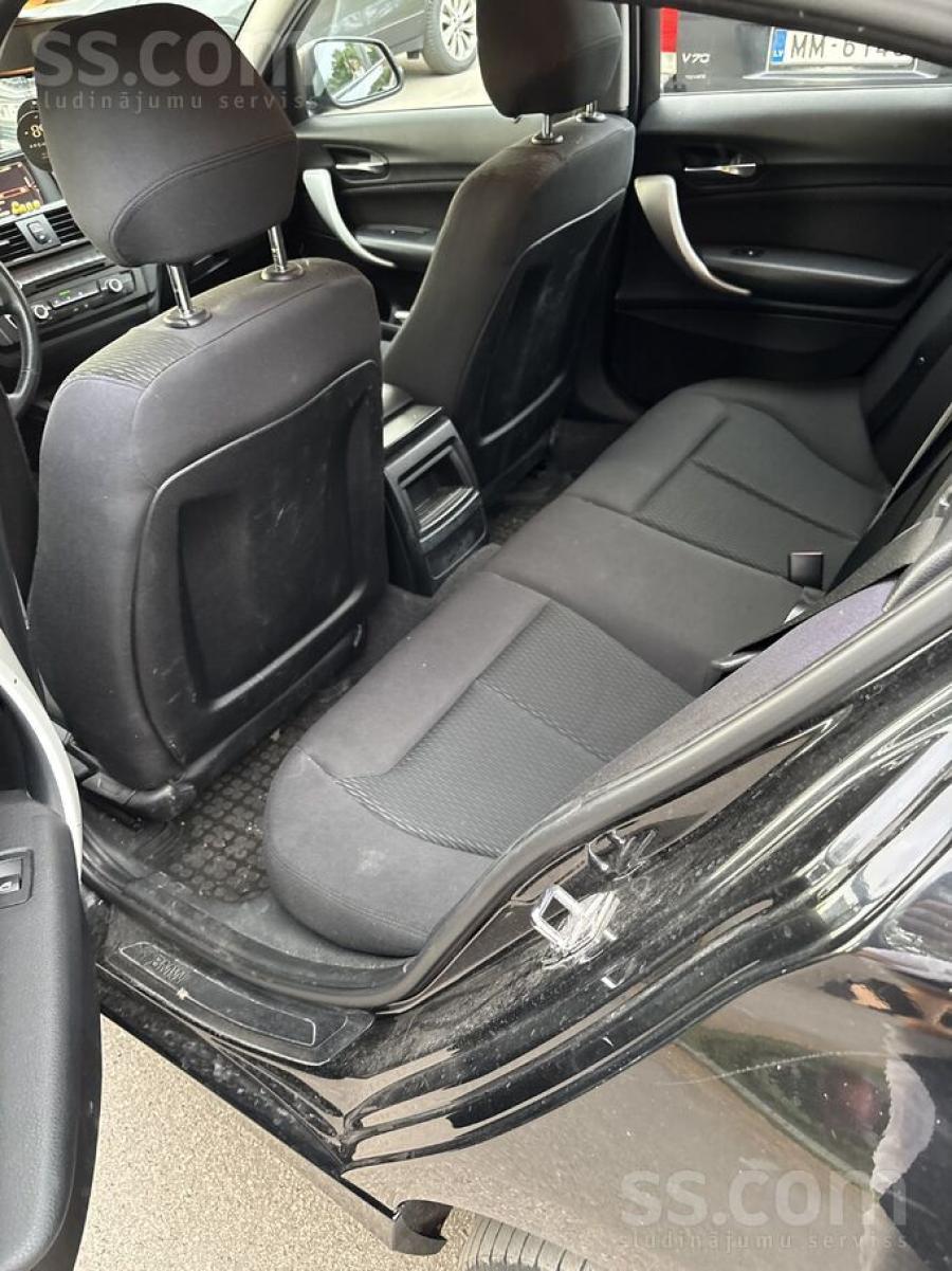 Melns BMW 116 2011 Rīga, ar dzinēja tilpumu 2.00 L un nobraukumu 327 tūkst. km par 5095 €, foto 11 vietnē AUTOMOTO.COM.LV