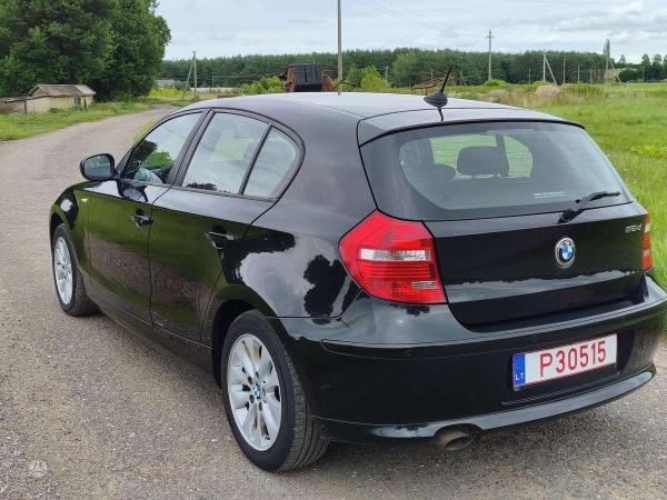 Black BMW 116 2011 in Kedainiai, with an engine capacity of 2.00 L and mileage of 200 thousand km for 3650 €, photo 3 on AUTOMOTO.COM.LV