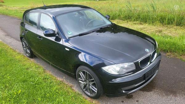 Black BMW 116 2011 in Ignalina, with an engine capacity of 1.60 L and mileage of 180 thousand km for 3299 €, photo 4 on AUTOMOTO.COM.LV
