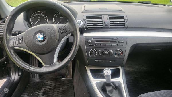 Black BMW 116 2011 in Ignalina, with an engine capacity of 1.60 L and mileage of 180 thousand km for 3299 €, photo 10 on AUTOMOTO.COM.LV