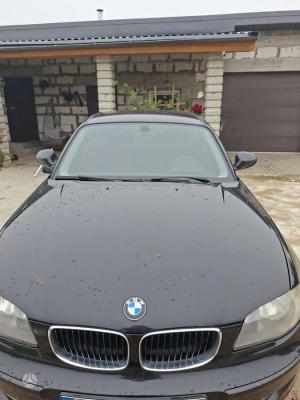 Black BMW 116 2011 in Vilnius, with an engine capacity of 2.00 L and mileage of 272 thousand km for 3100 €, photo  on AUTOMOTO.COM.LV