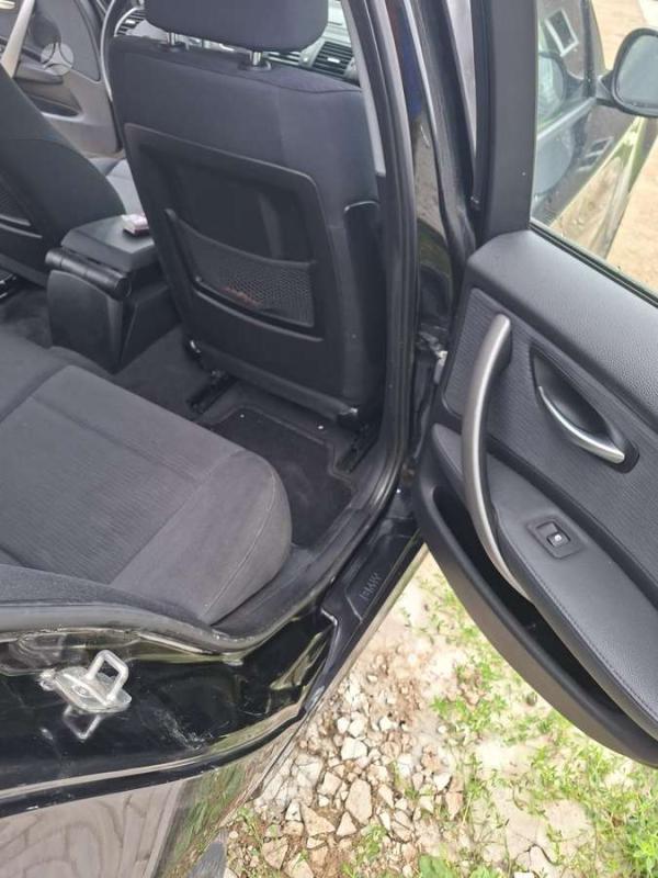 Black BMW 116 2011 in Vilnius, with an engine capacity of 2.00 L and mileage of 272 thousand km for 3100 €, photo 10 on AUTOMOTO.COM.LV