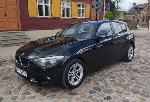 Black BMW 116 2011 in Jelgava, with an engine capacity of 2.00 L and mileage of 328 thousand km for 4390 €, photo  on AUTOMOTO.COM.LV