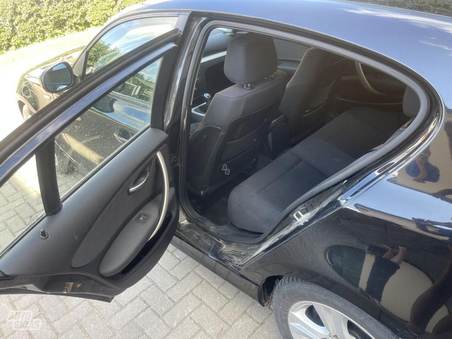 Melns BMW 116 2011 Šauļi, ar dzinēja tilpumu 2.00 L un nobraukumu 135 tūkst. km par 3500 €, foto 23 vietnē AUTOMOTO.COM.LV