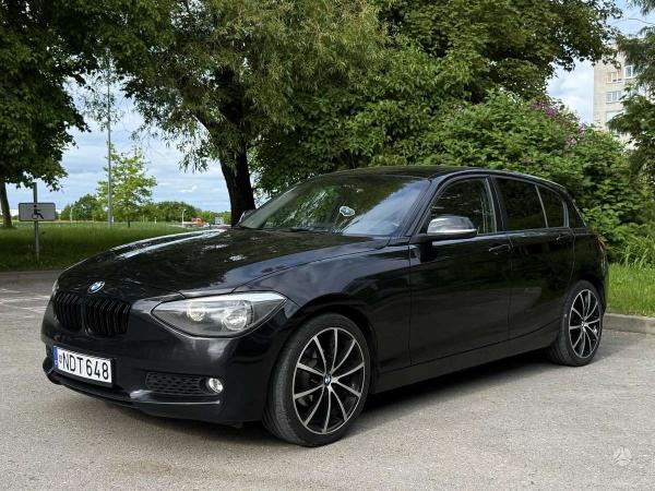 Black BMW 116 2011 in Jonava, with an engine capacity of 2.00 L and mileage of 300 thousand km for 3900 €, photo 2 on AUTOMOTO.COM.LV