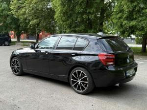 Black BMW 116 2011 in Jonava, with an engine capacity of 2.00 L and mileage of 300 thousand km for 3900 €, photo 5 on AUTOMOTO.COM.LV