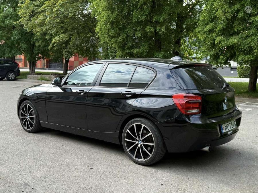 Black BMW 116 2011 in Jonava, with an engine capacity of 2.00 L and mileage of 300 thousand km for 3900 €, photo 5 on AUTOMOTO.COM.LV