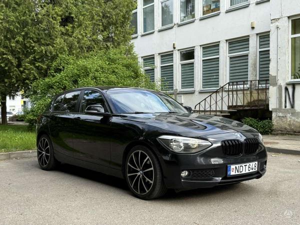 Black BMW 116 2011 in Jonava, with an engine capacity of 2.00 L and mileage of 300 thousand km for 3900 €, photo 7 on AUTOMOTO.COM.LV