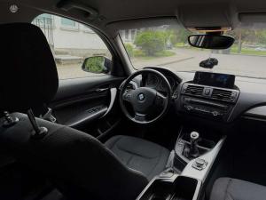 Black BMW 116 2011 in Jonava, with an engine capacity of 2.00 L and mileage of 300 thousand km for 3900 €, photo 10 on AUTOMOTO.COM.LV