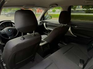 Black BMW 116 2011 in Jonava, with an engine capacity of 2.00 L and mileage of 300 thousand km for 3900 €, photo 11 on AUTOMOTO.COM.LV