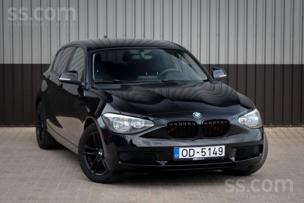 Black BMW 116 2012 in Talsi, with an engine capacity of 2.00 L and mileage of 274 thousand km for 6690 €, photo 1 on AUTOMOTO.COM.LV