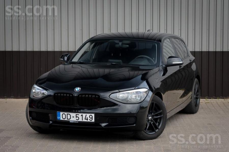 Black BMW 116 2012 in Talsi, with an engine capacity of 2.00 L and mileage of 274 thousand km for 6690 €, photo 3 on AUTOMOTO.COM.LV