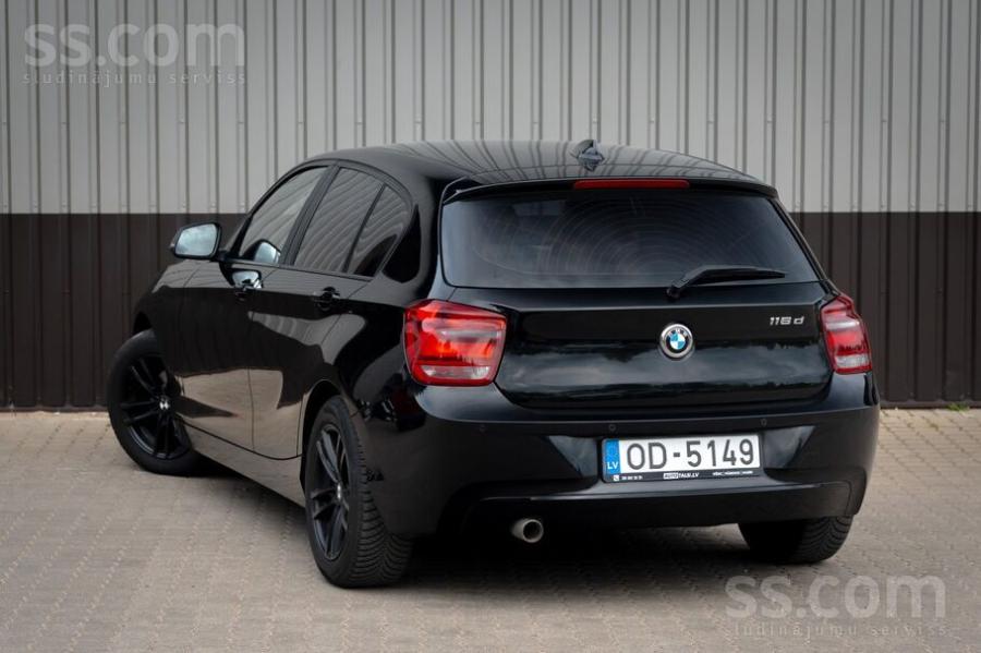 Black BMW 116 2012 in Talsi, with an engine capacity of 2.00 L and mileage of 274 thousand km for 6690 €, photo 4 on AUTOMOTO.COM.LV