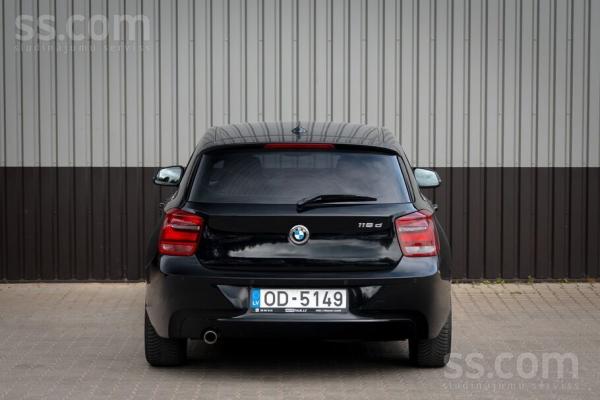 Black BMW 116 2012 in Talsi, with an engine capacity of 2.00 L and mileage of 274 thousand km for 6690 €, photo 5 on AUTOMOTO.COM.LV