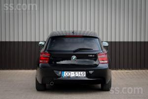 Black BMW 116 2012 in Talsi, with an engine capacity of 2.00 L and mileage of 274 thousand km for 6690 €, photo 5 on AUTOMOTO.COM.LV