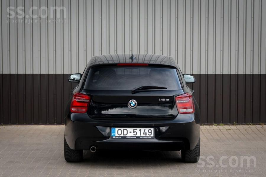 Black BMW 116 2012 in Talsi, with an engine capacity of 2.00 L and mileage of 274 thousand km for 6690 €, photo 5 on AUTOMOTO.COM.LV