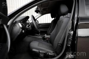 Black BMW 116 2012 in Talsi, with an engine capacity of 2.00 L and mileage of 274 thousand km for 6690 €, photo 9 on AUTOMOTO.COM.LV