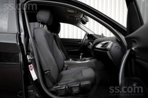 Black BMW 116 2012 in Talsi, with an engine capacity of 2.00 L and mileage of 274 thousand km for 6690 €, photo 12 on AUTOMOTO.COM.LV