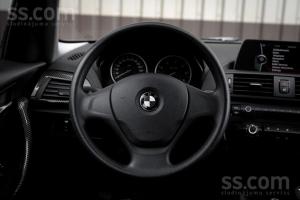 Black BMW 116 2012 in Talsi, with an engine capacity of 2.00 L and mileage of 274 thousand km for 6690 €, photo 16 on AUTOMOTO.COM.LV